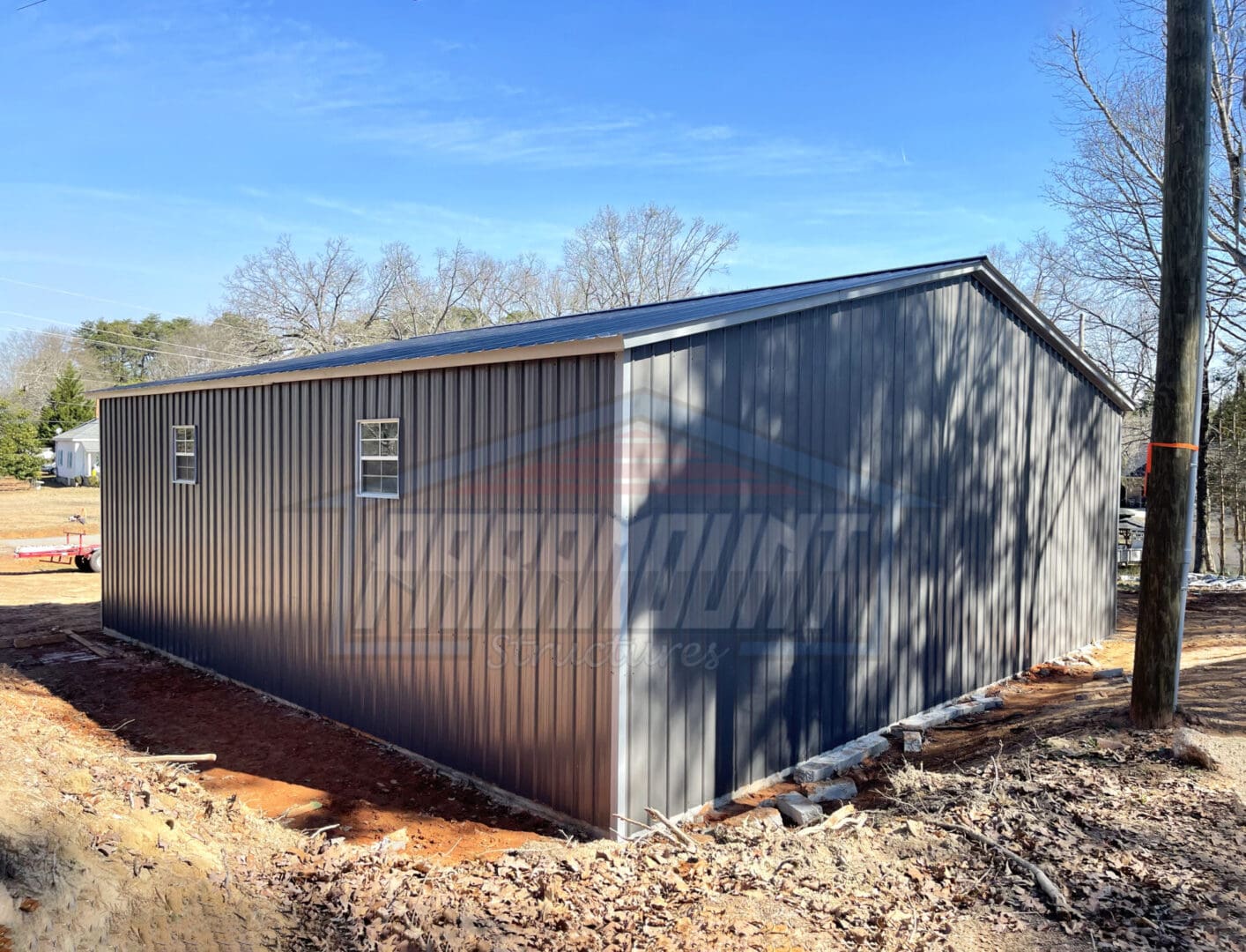 Grey Metal Building with Windows - Paramount Structures